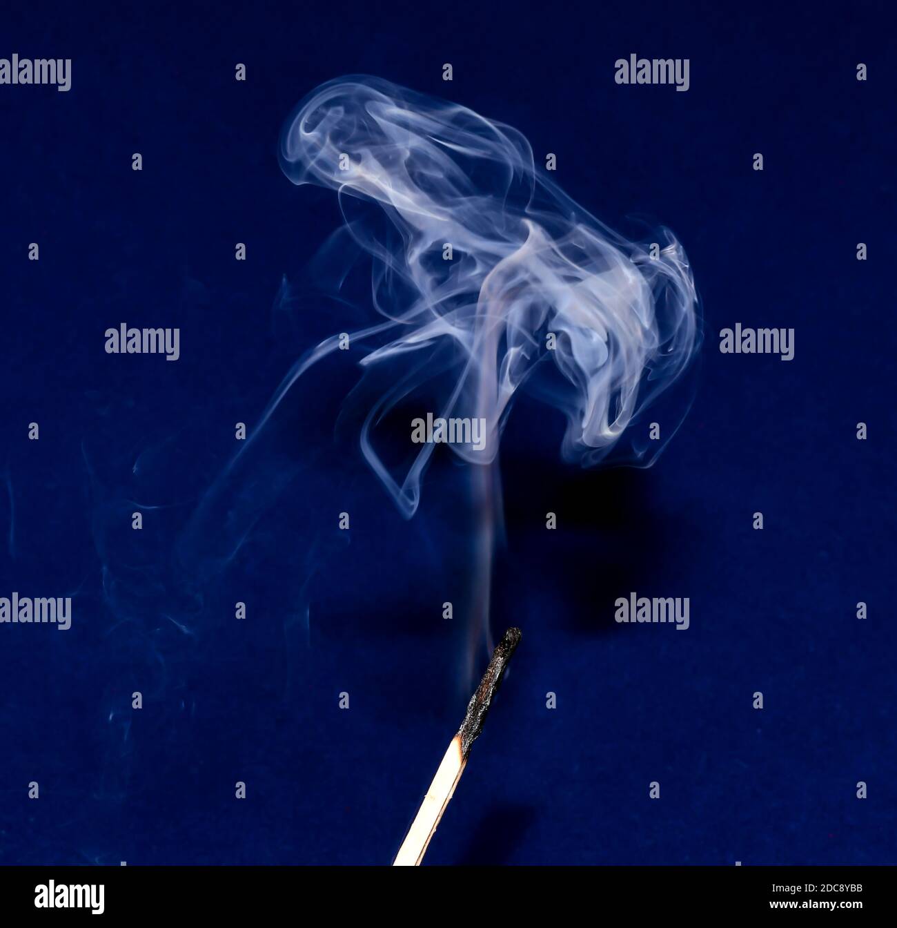 smoke trailing off matchstick on fire Stock Photo - Alamy