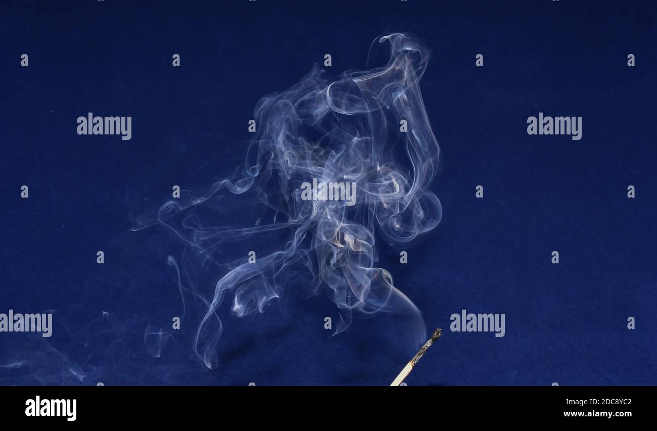 smoke trailing off matchstick on fire Stock Photo - Alamy