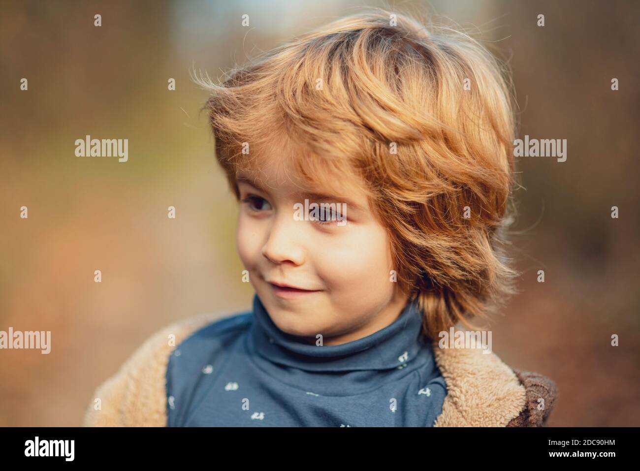 Autumn portrait of kids outdoor in park. Smiling child walking in sunny ...