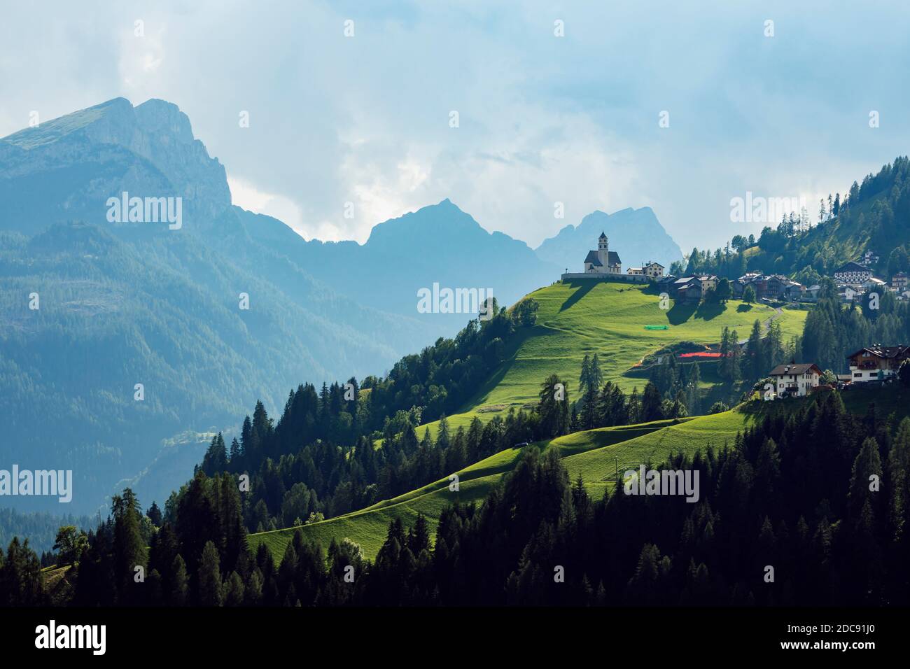 Mountainous landscape with villages of Colle Santa Lucia with church in ...