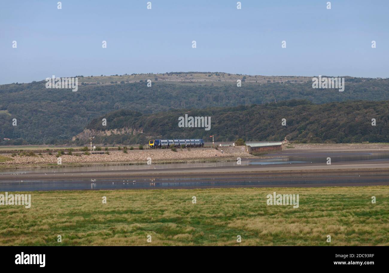 Northern rail CAF class195 train crossing Arnside viaduct across the ...