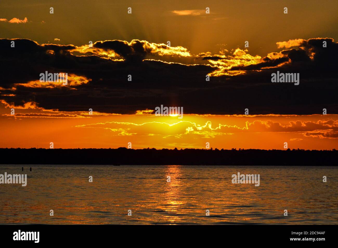 Colorful summer sunset on the lake in northern Minnesota Stock Photo ...