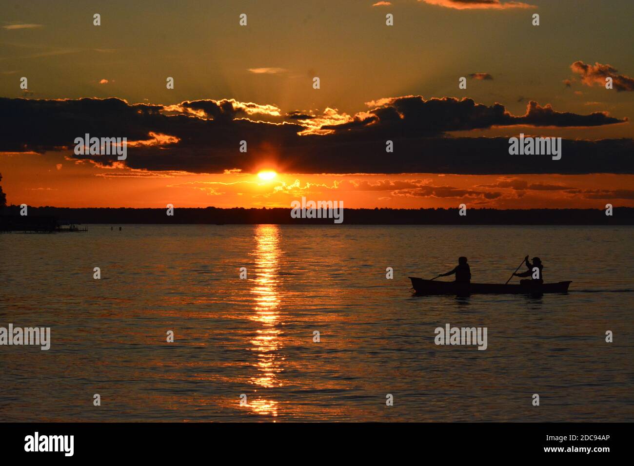 Colorful summer sunset on the lake in northern Minnesota Stock Photo ...