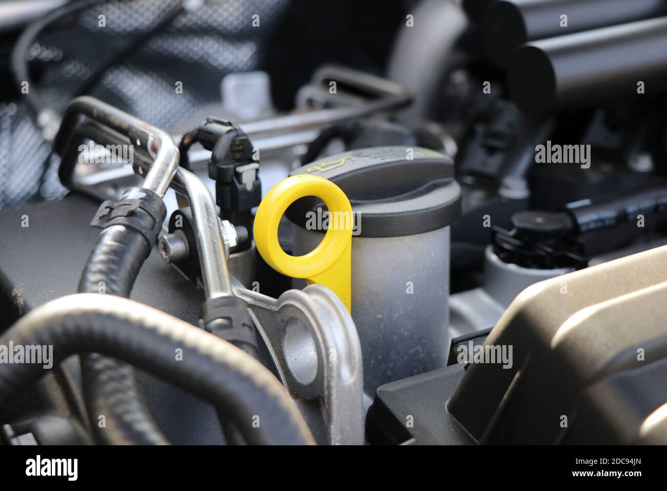 Closeup view of an oil filler in a motor engine Stock Photo - Alamy