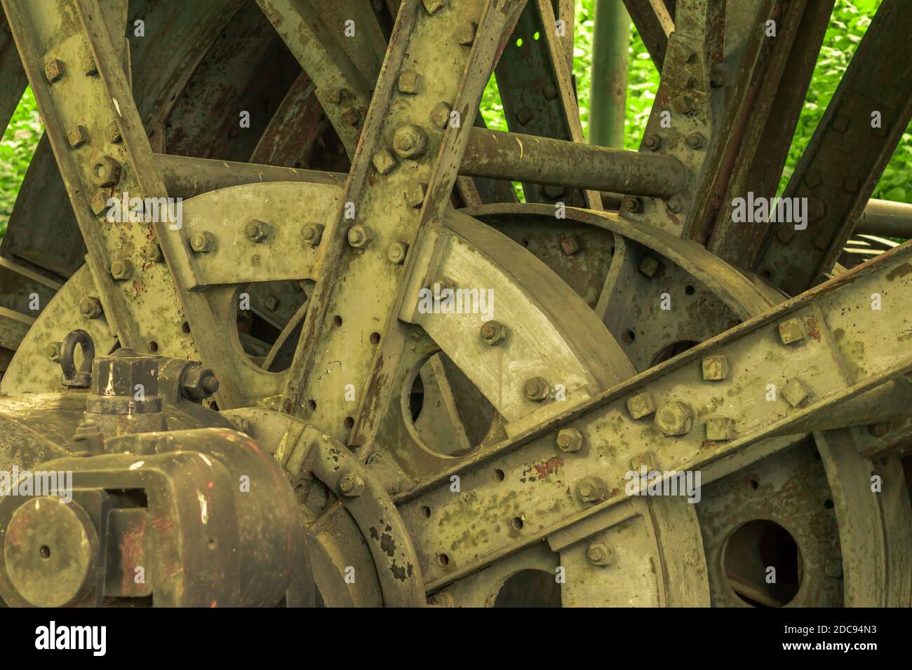 Closeup view of an old iron flywheel Stock Photo - Alamy