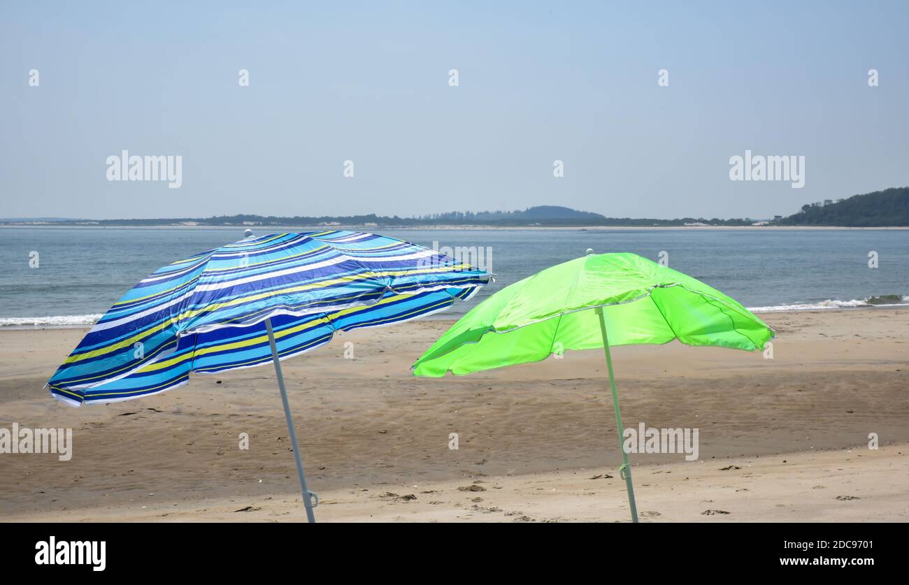 beach umbrella in the sand dune beach along the Atlantic ocean coast ...