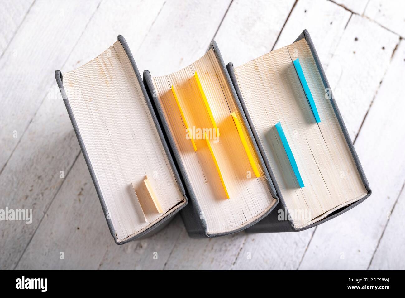 Books with colored sticky notes for marking pages. Literature in the ...