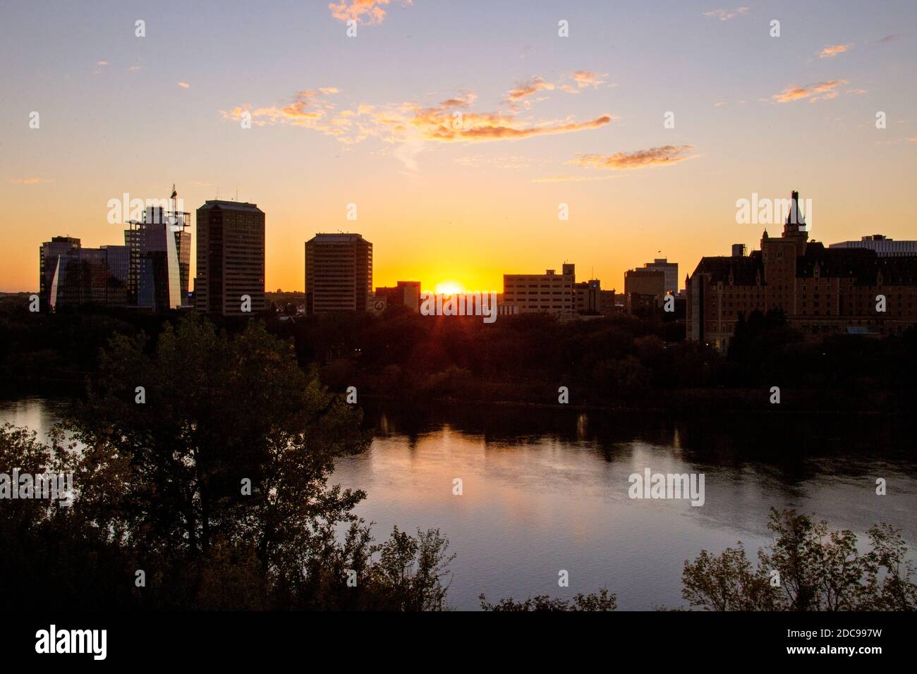 Sunset Downtown Saskatoon sun setting over City Stock Photo - Alamy