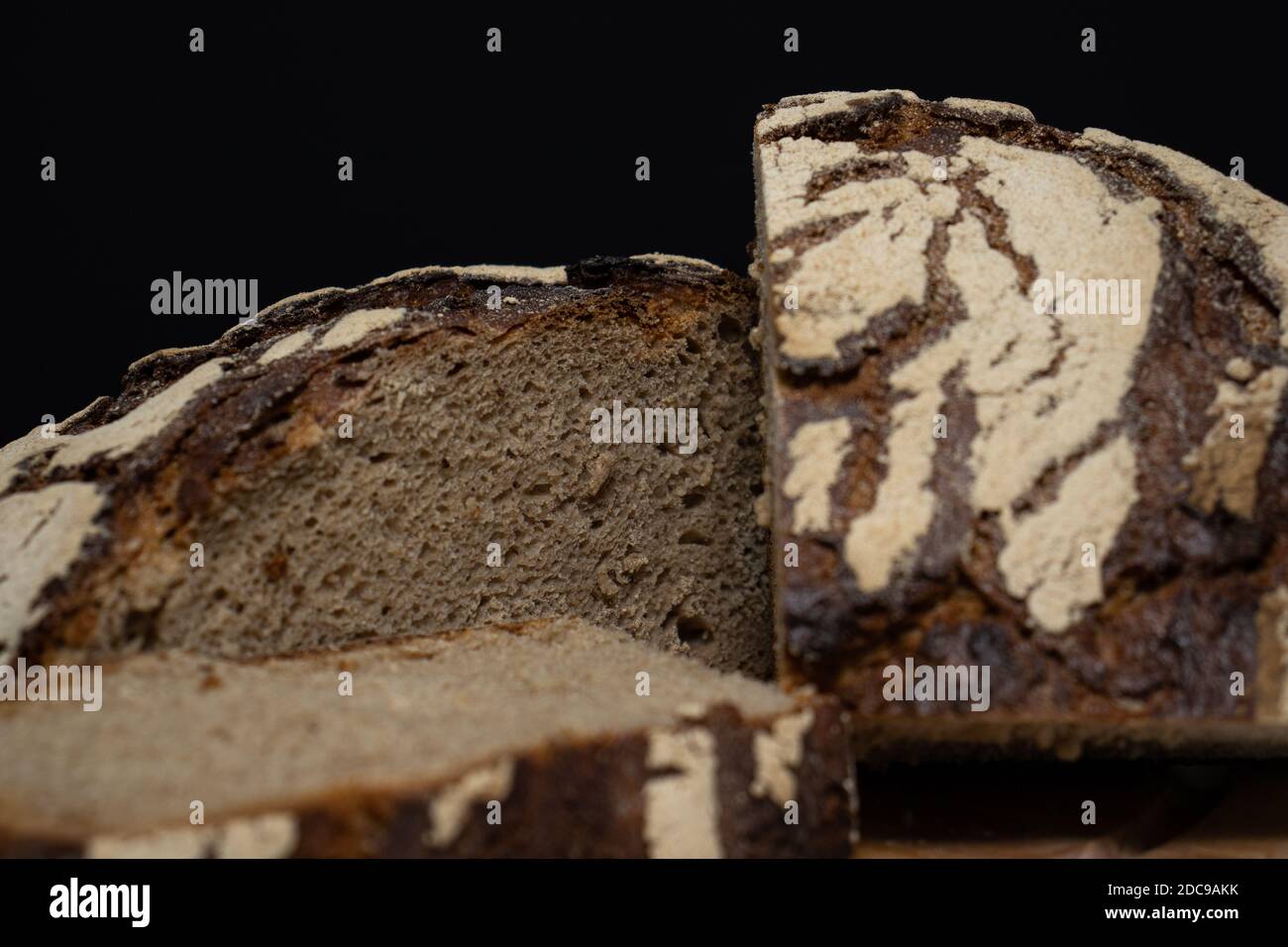 Homemade bread that is prepared in a roll and is pressed with white ...