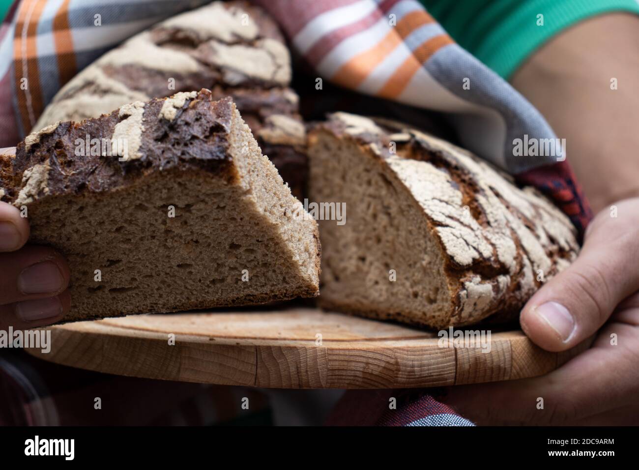 Homemade bread that is prepared in a roll and is pressed with white ...