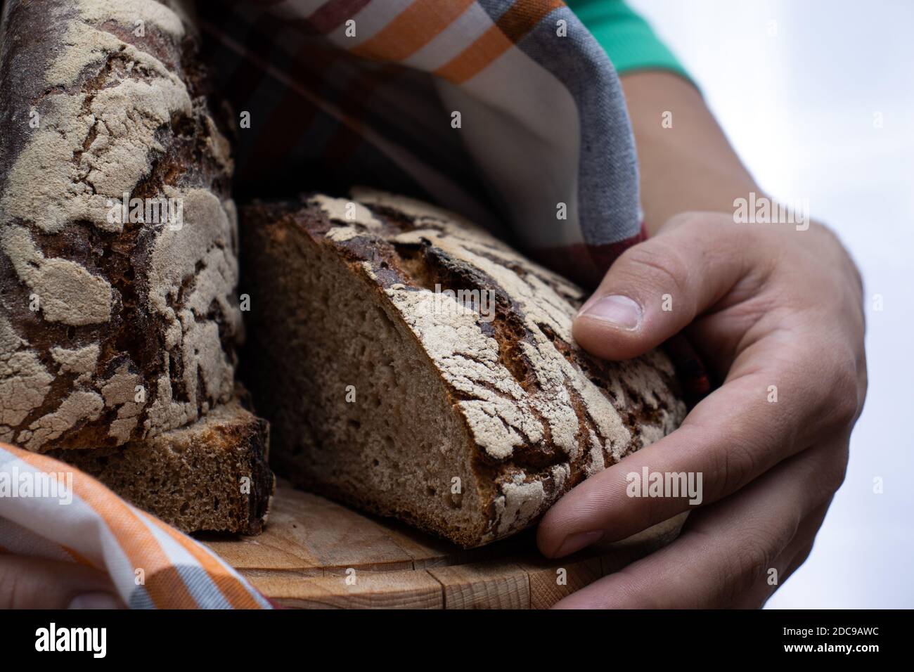 Homemade bread that is prepared in a roll and is pressed with white ...