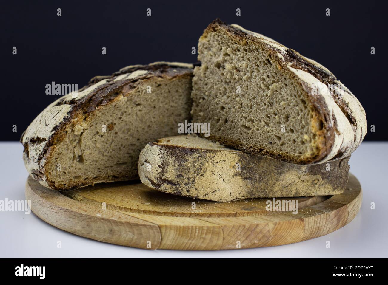 Homemade bread that is prepared in a roll and is pressed with white ...