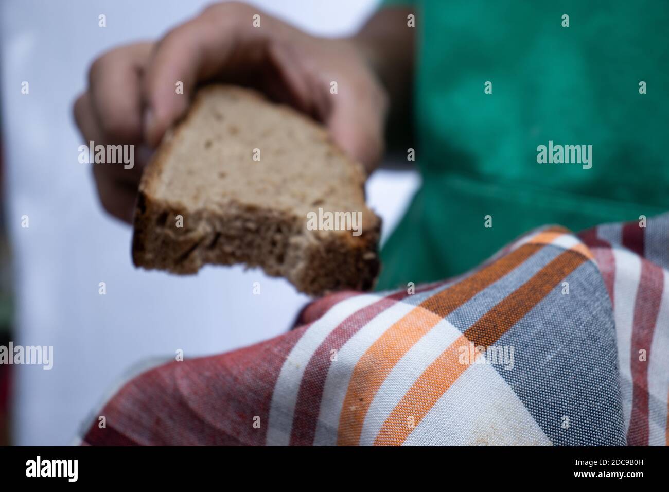 Homemade bread that is prepared in a roll and is pressed with white ...