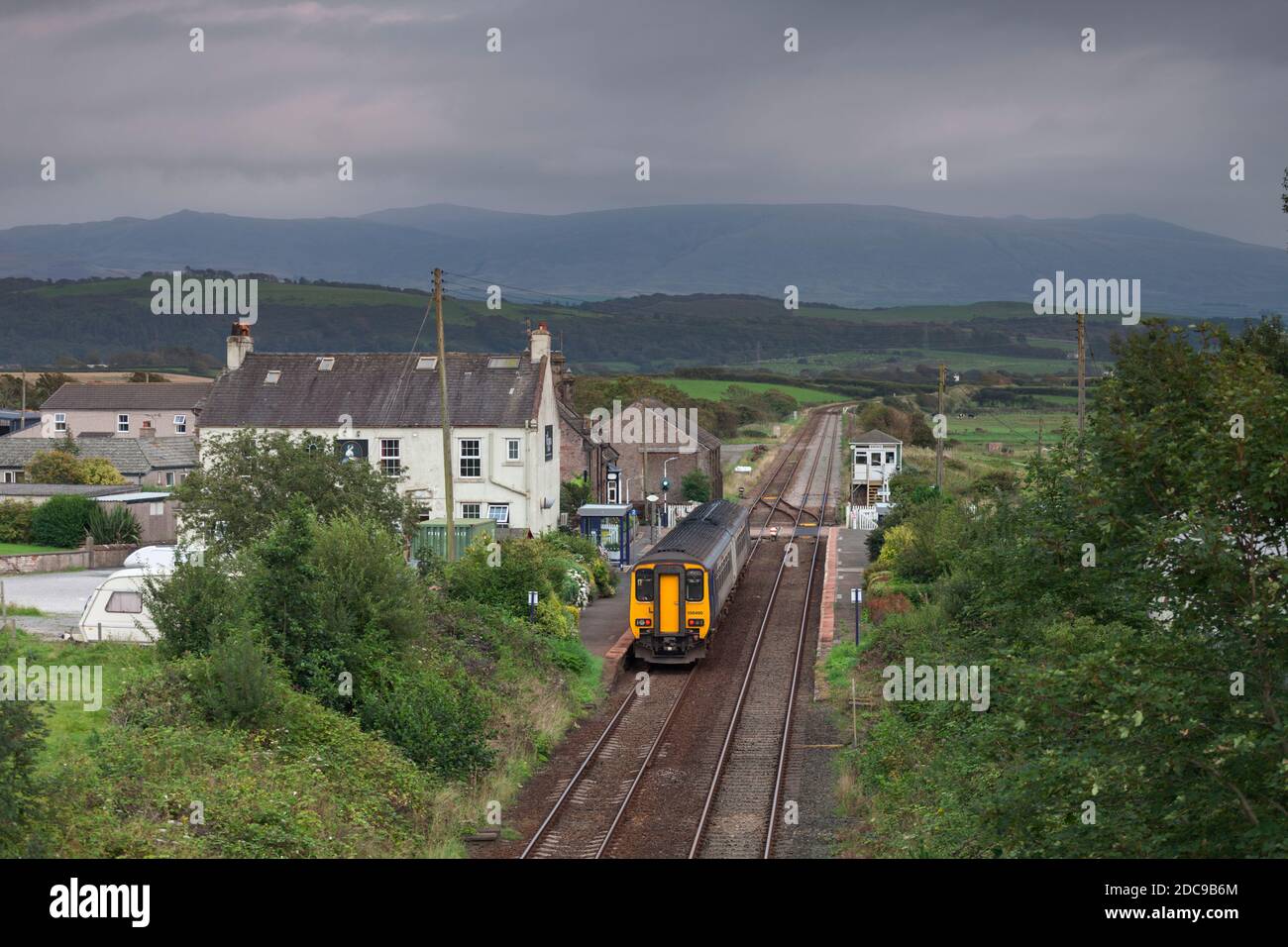 Northern rail class 156 sprinter train arriving at the small request ...
