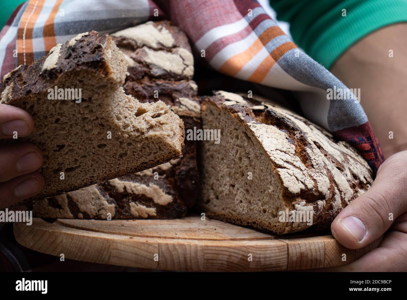 Homemade bread sprinkled with natural flour in natural light Stock ...