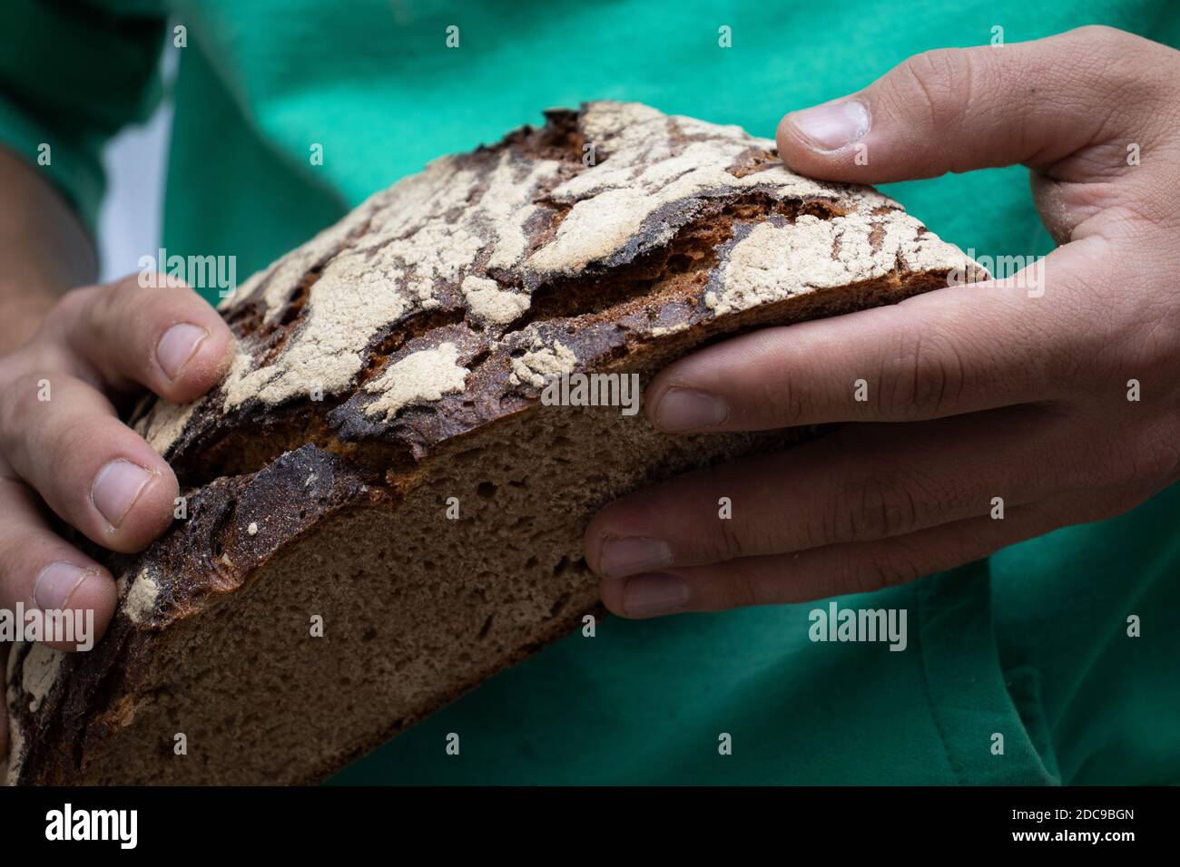 Homemade bread sprinkled with natural flour in natural light Stock ...
