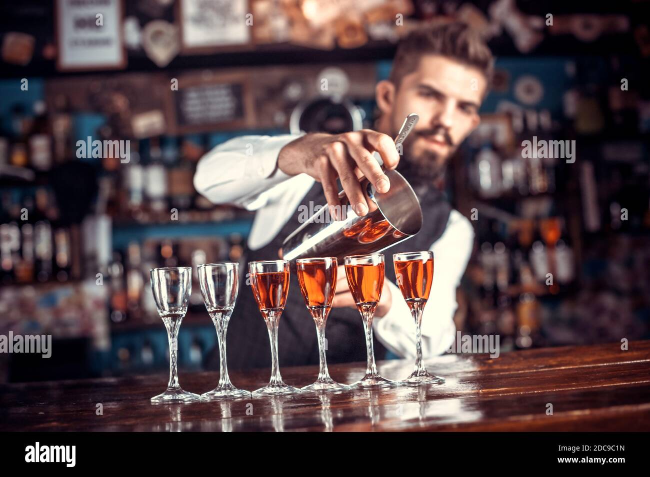 Bartender work behind bar making hi-res stock photography and images ...