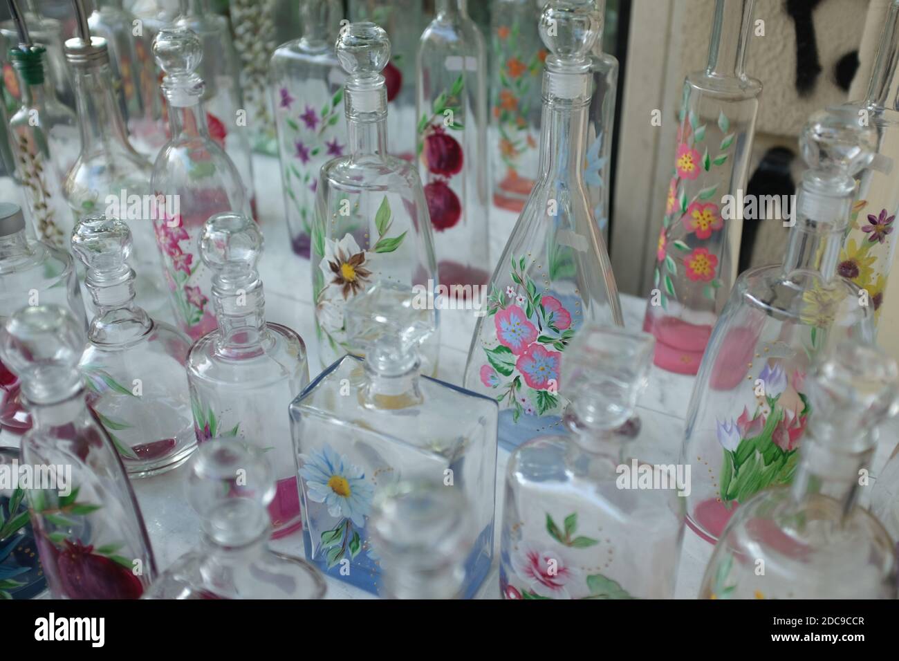 Table full of bottles Stock Photo - Alamy