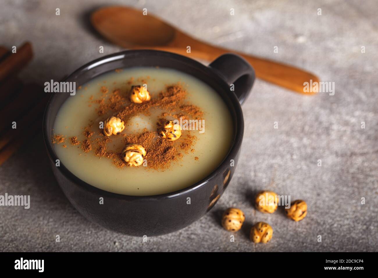 Boza or Bosa, traditional Turkish drink with roasted chickpea in ...