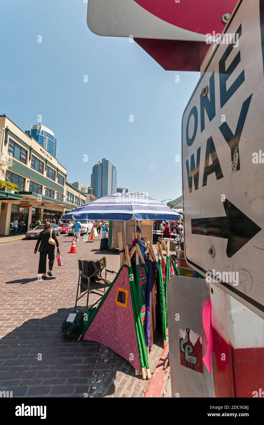 One Way sign and people in scene from Pike Place Market in Belltown in ...