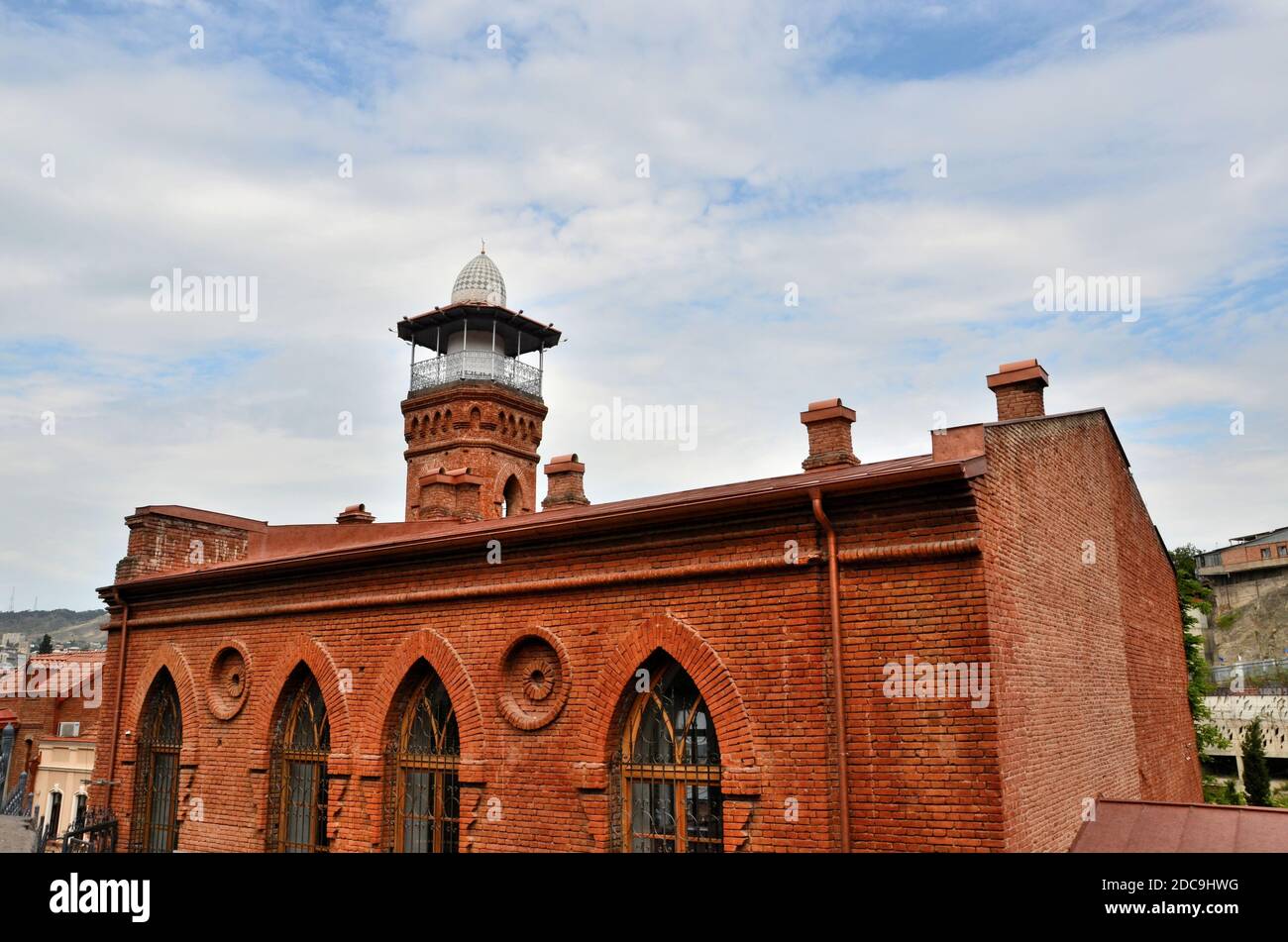 Red brick Jumah Central mosque with arches and minaret Tbilisi Georgia ...