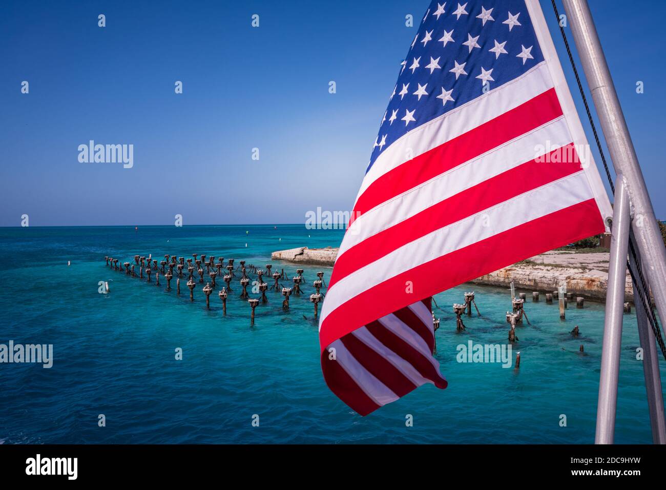 American Flag Waves Over Ruins along coast of Dry Tortugas National ...