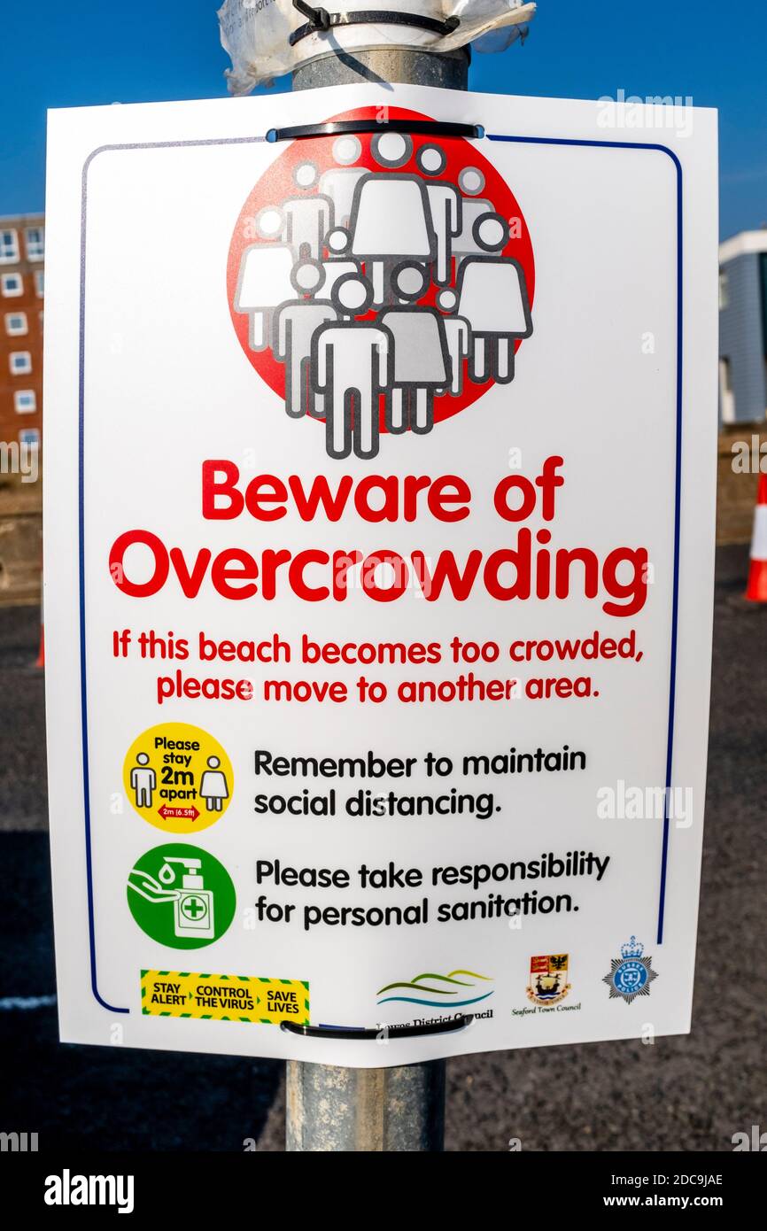 A Beach Warning Sign Against Overcrowding During The Covid 19 Pandemic ...
