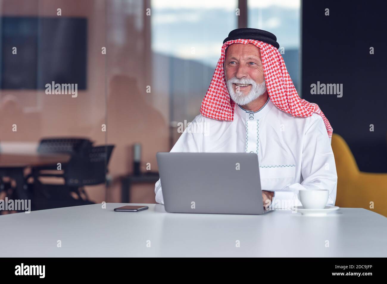 Arab businessman laptop computer in modern office Stock Photo - Alamy