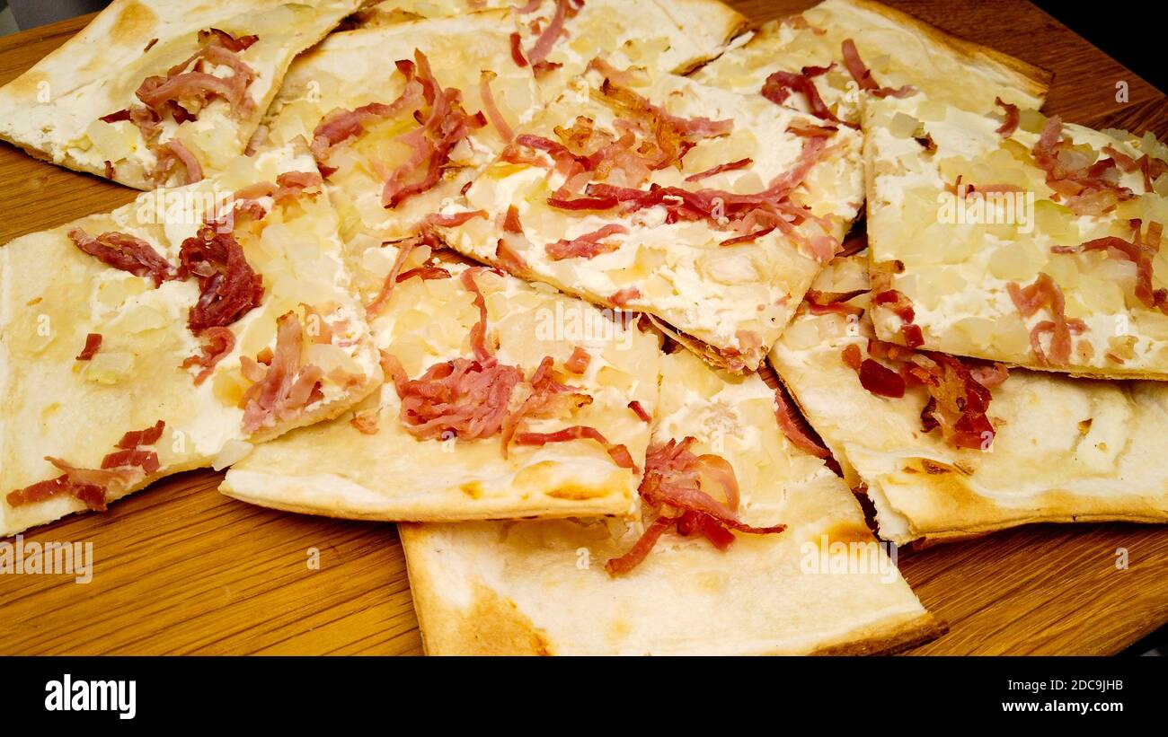 Flambee pie - a French specialty called Tarte flambee Stock Photo - Alamy