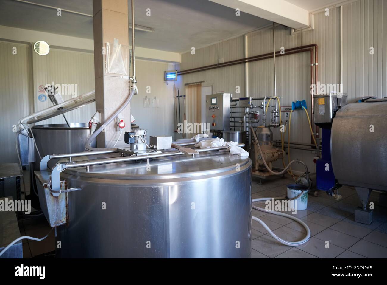 local Cheese factory production indoor Stock Photo - Alamy