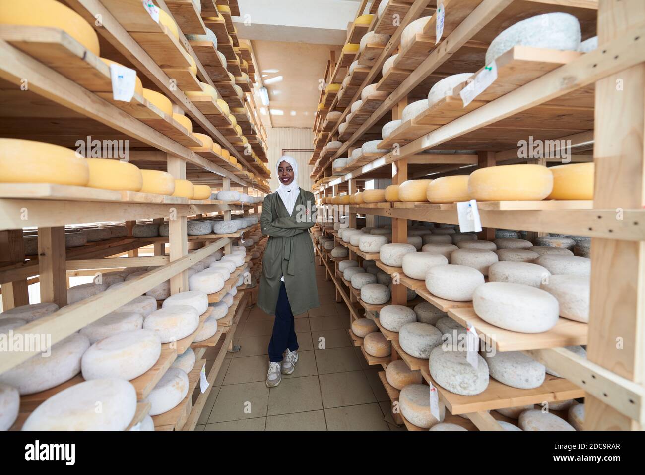 African black muslim business woman in local cheese production company ...