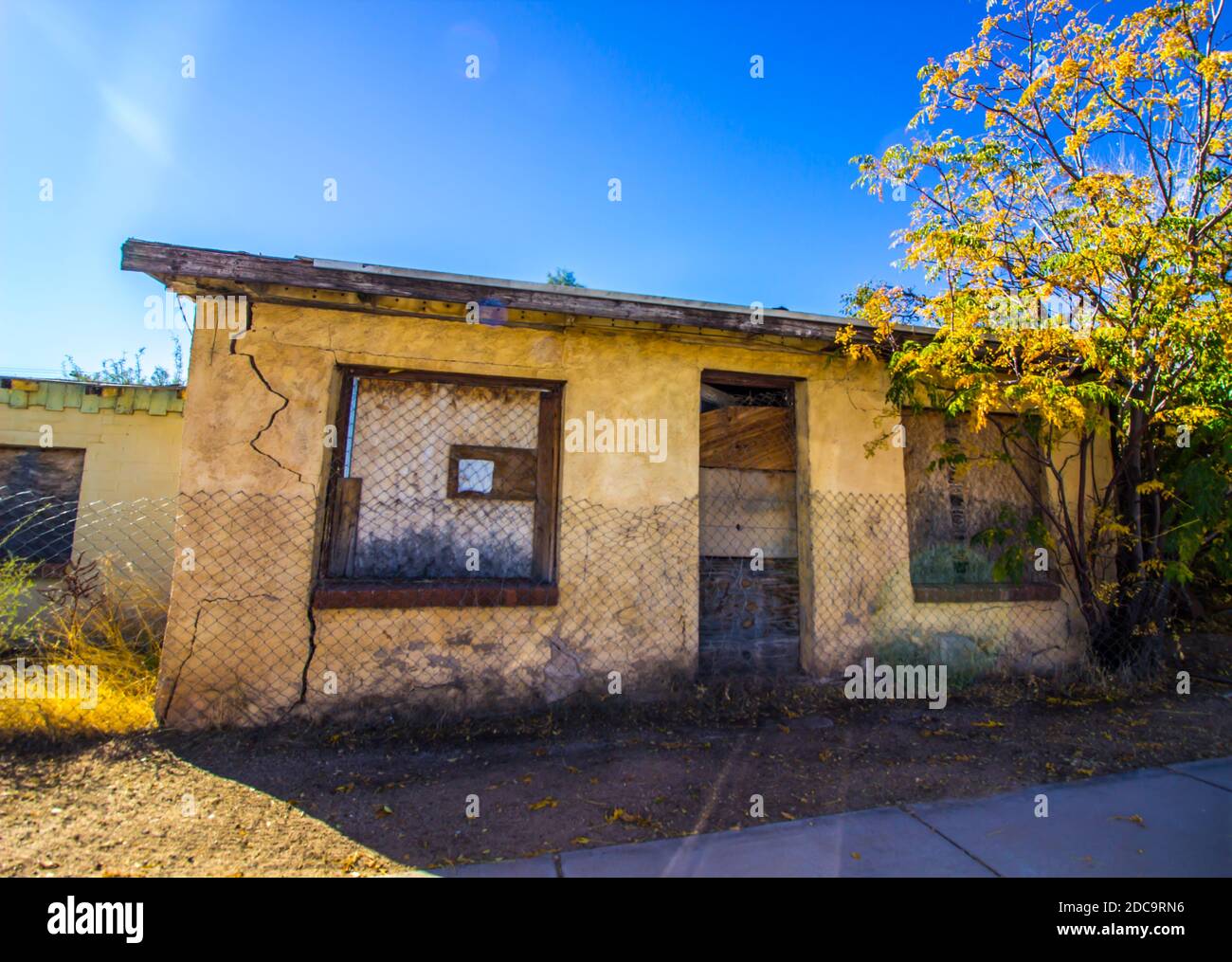Condemned One Story Home With Boarded Up Entrance & Windows Stock Photo ...