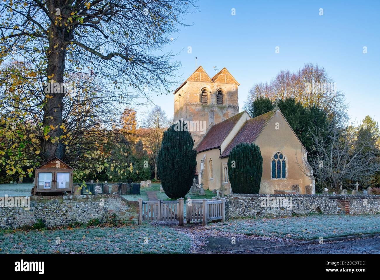 St Bartholomew church on a frosty autumn morning just after sunrise ...