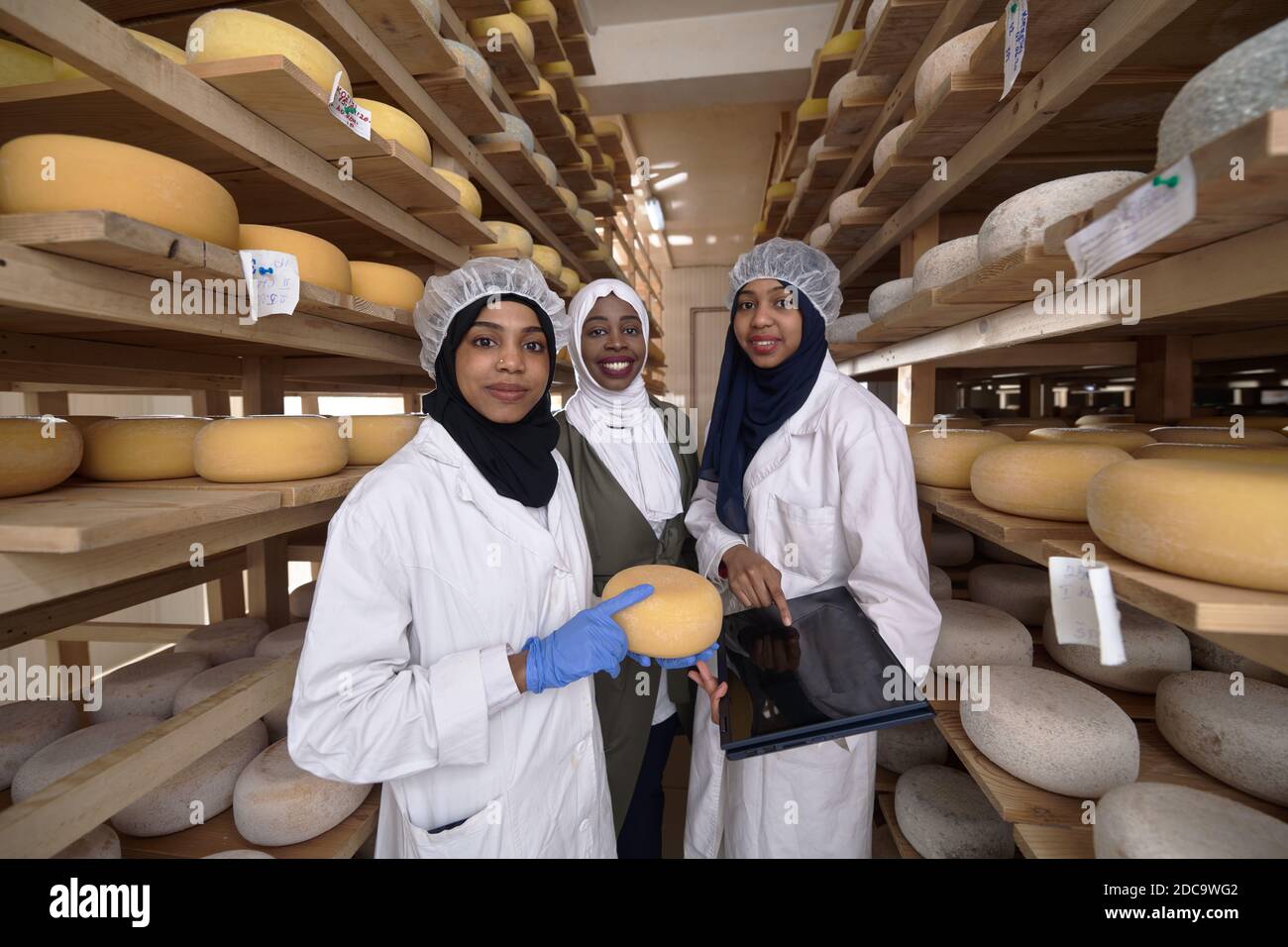business woman team in local cheese production company Stock Photo - Alamy