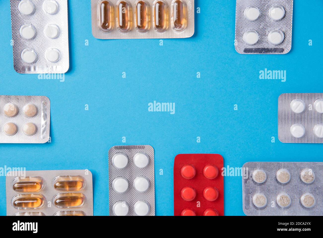 Different tablets and pill painkillers in the package and without it on ...