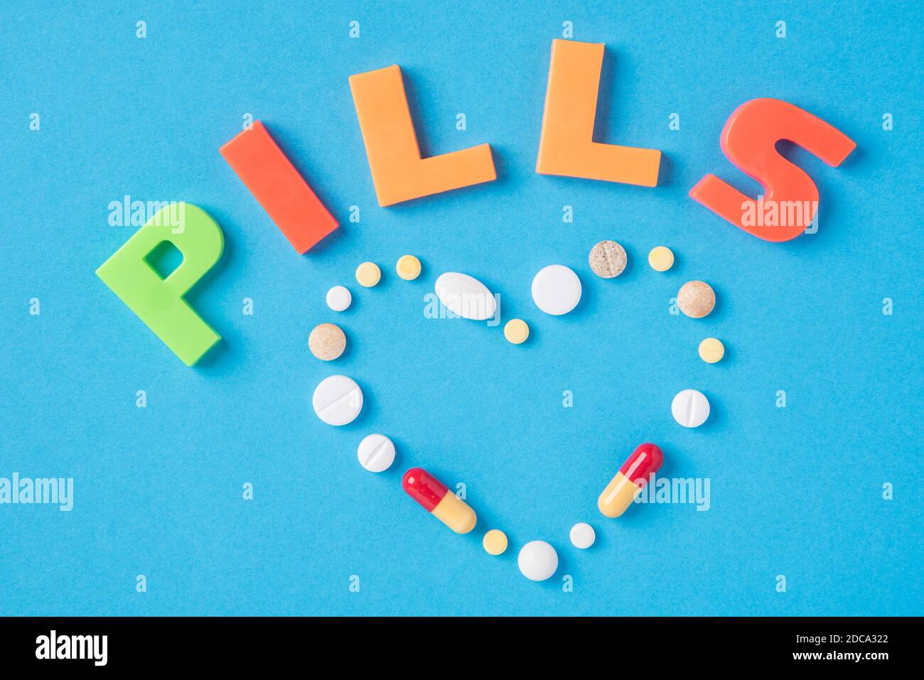 Different tablets and pill painkillers in the package and without it on ...