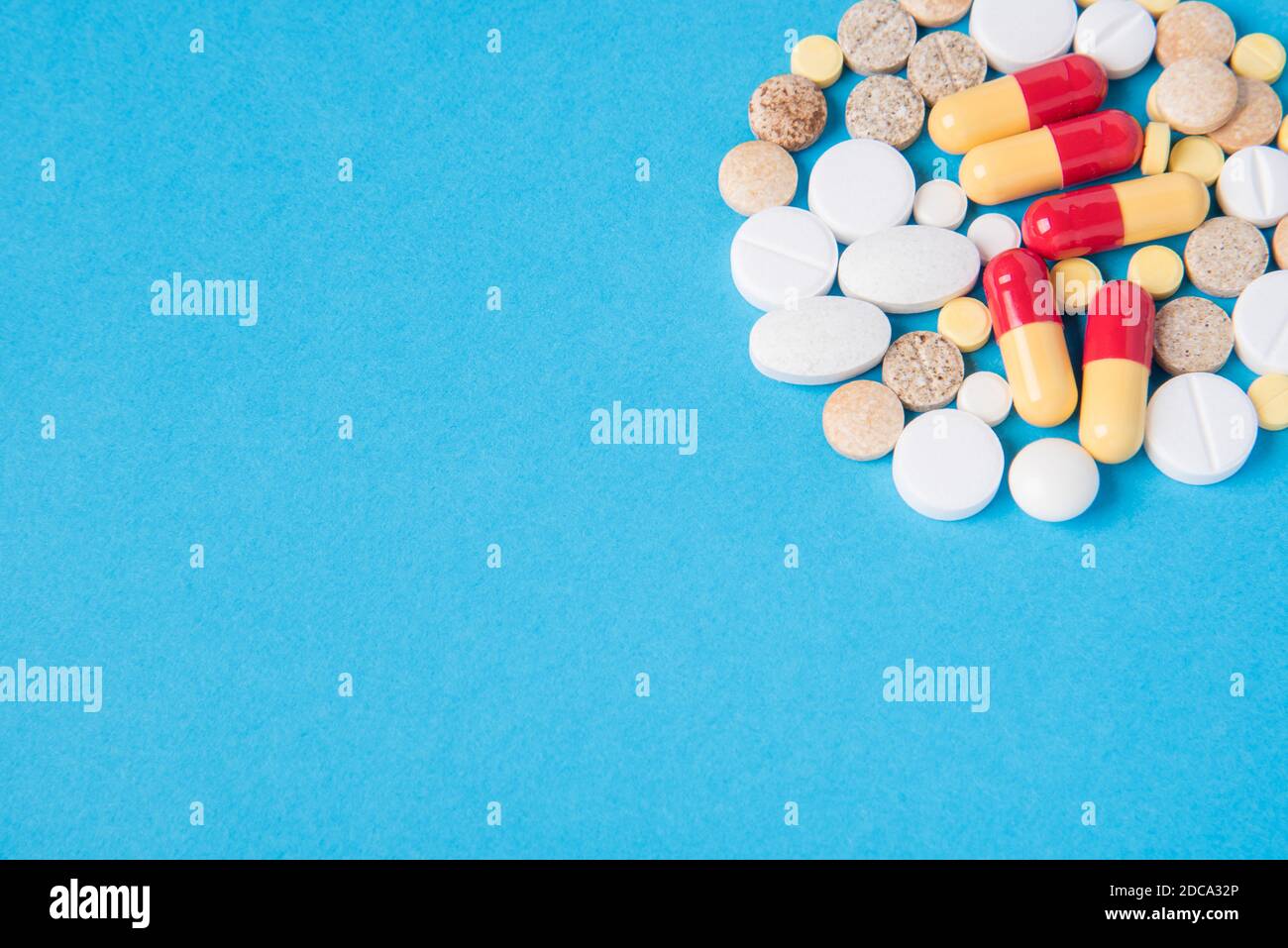Different tablets and pill painkillers in the package and without it on ...