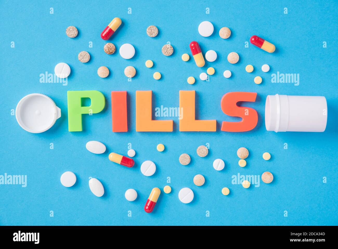 Different tablets and pill painkillers in the package and without it on ...