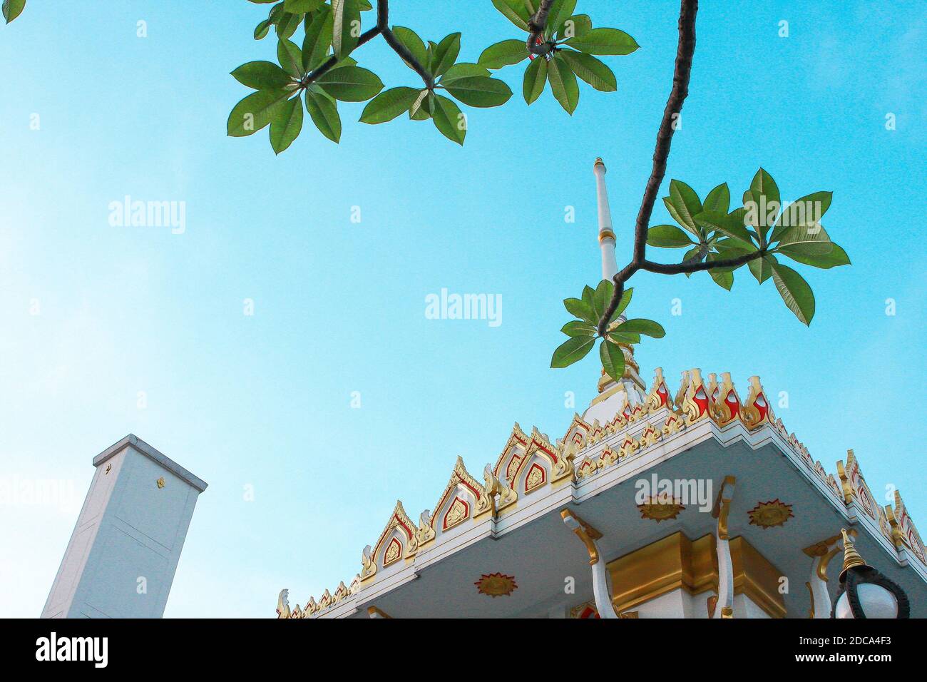 crematory and Plumeria tree On the sky background Stock Photo - Alamy