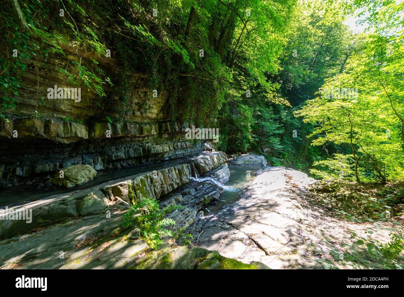 Textures of various stone layers in mountain river Stock Photo - Alamy