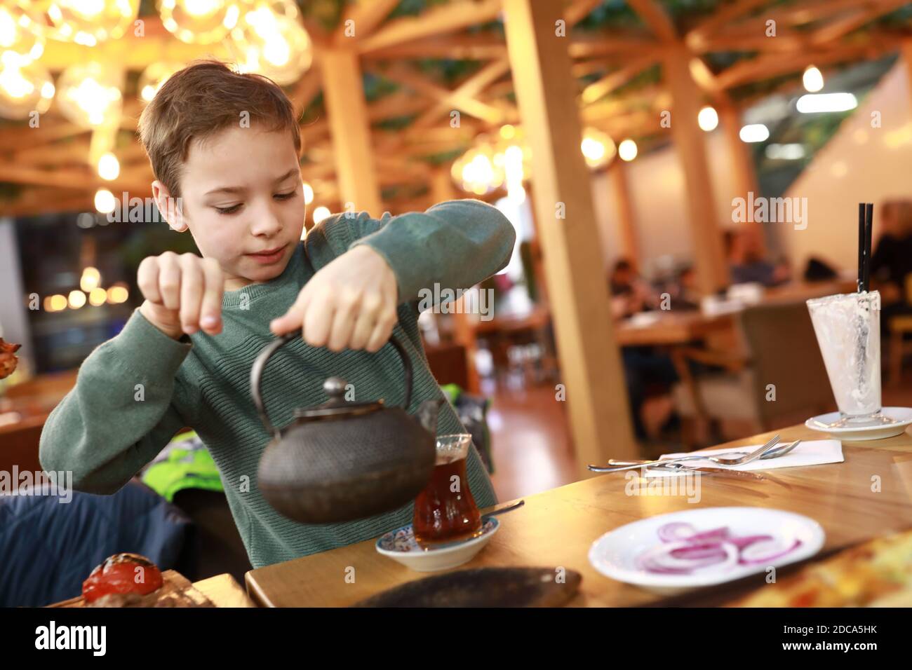 Turkish boy table hi-res stock photography and images - Alamy