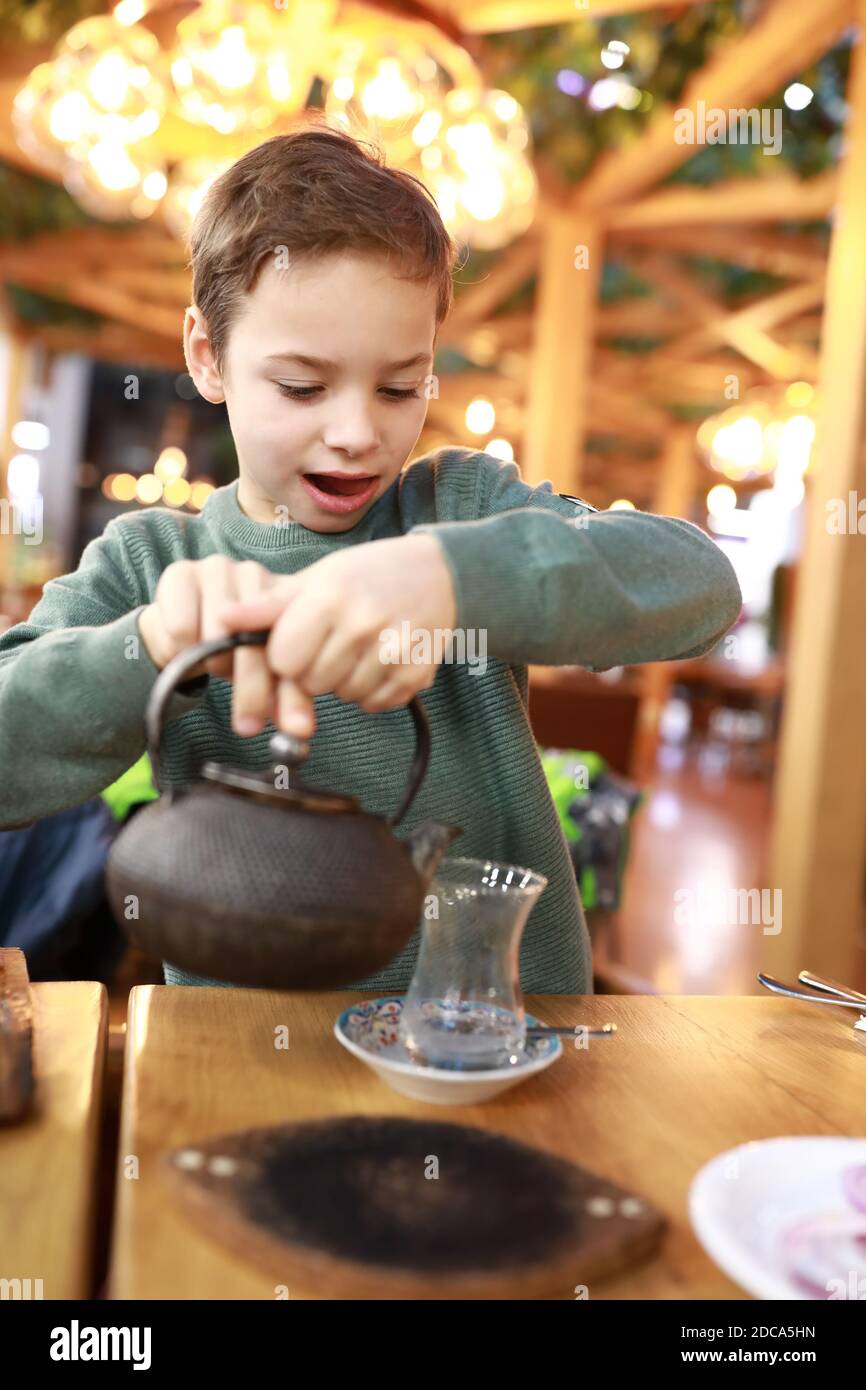 Turkish boy table hi-res stock photography and images - Alamy