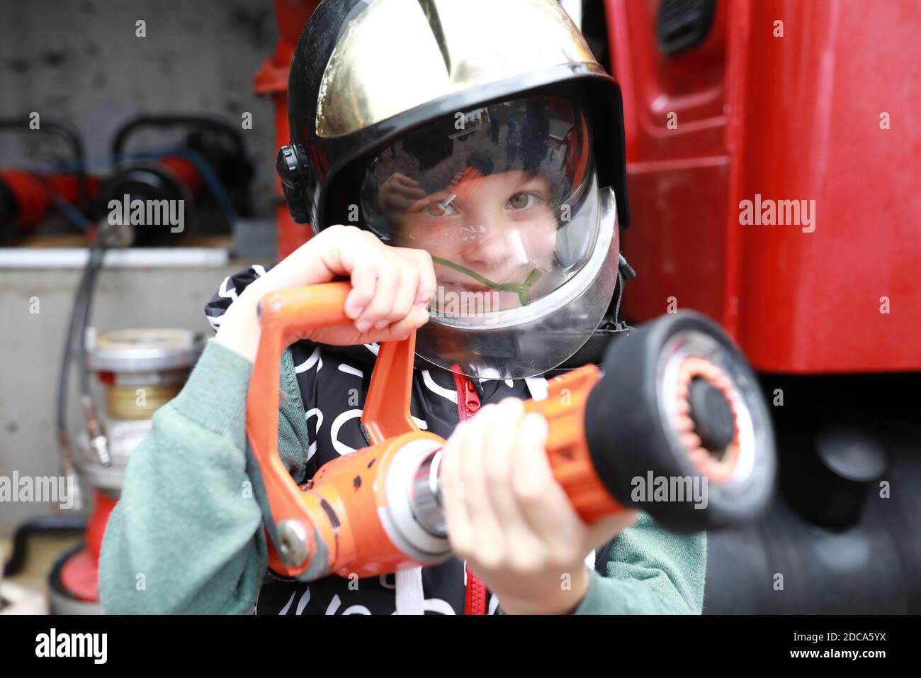 Boy playing with fire truck hi-res stock photography and images - Alamy