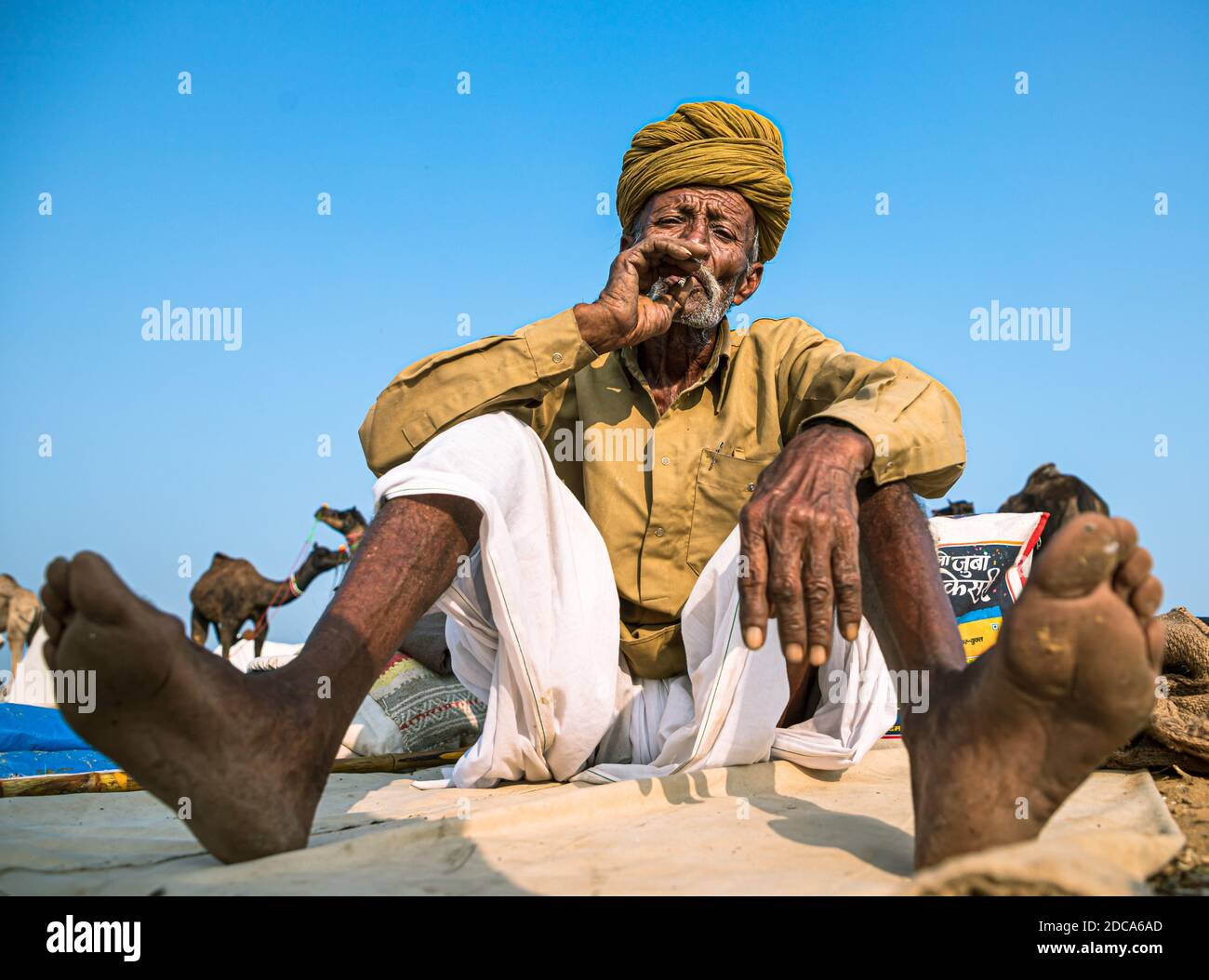 Rural man smoking chillum hi-res stock photography and images - Alamy