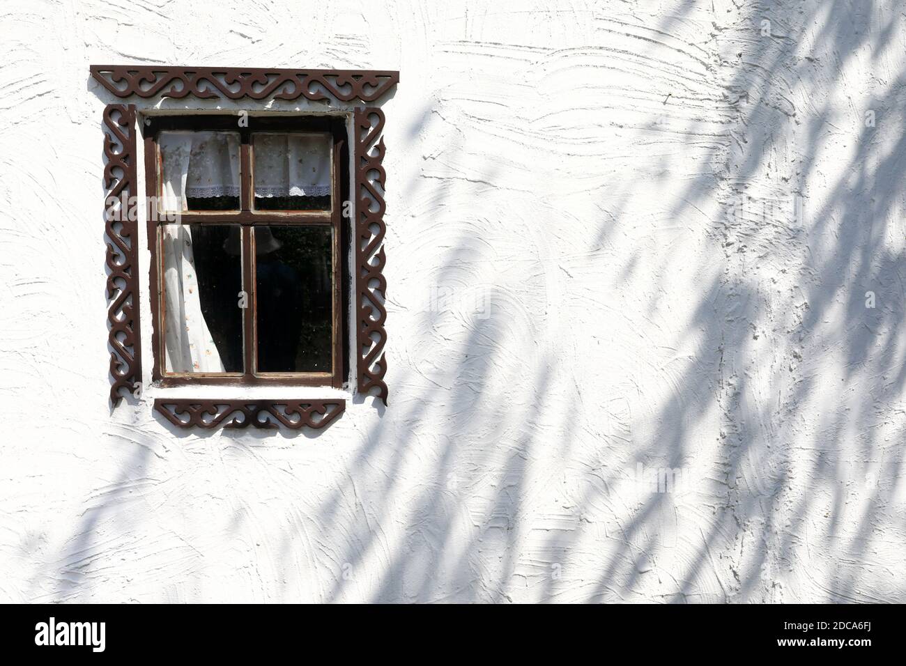 Whitewashed wall with window of country house Stock Photo - Alamy