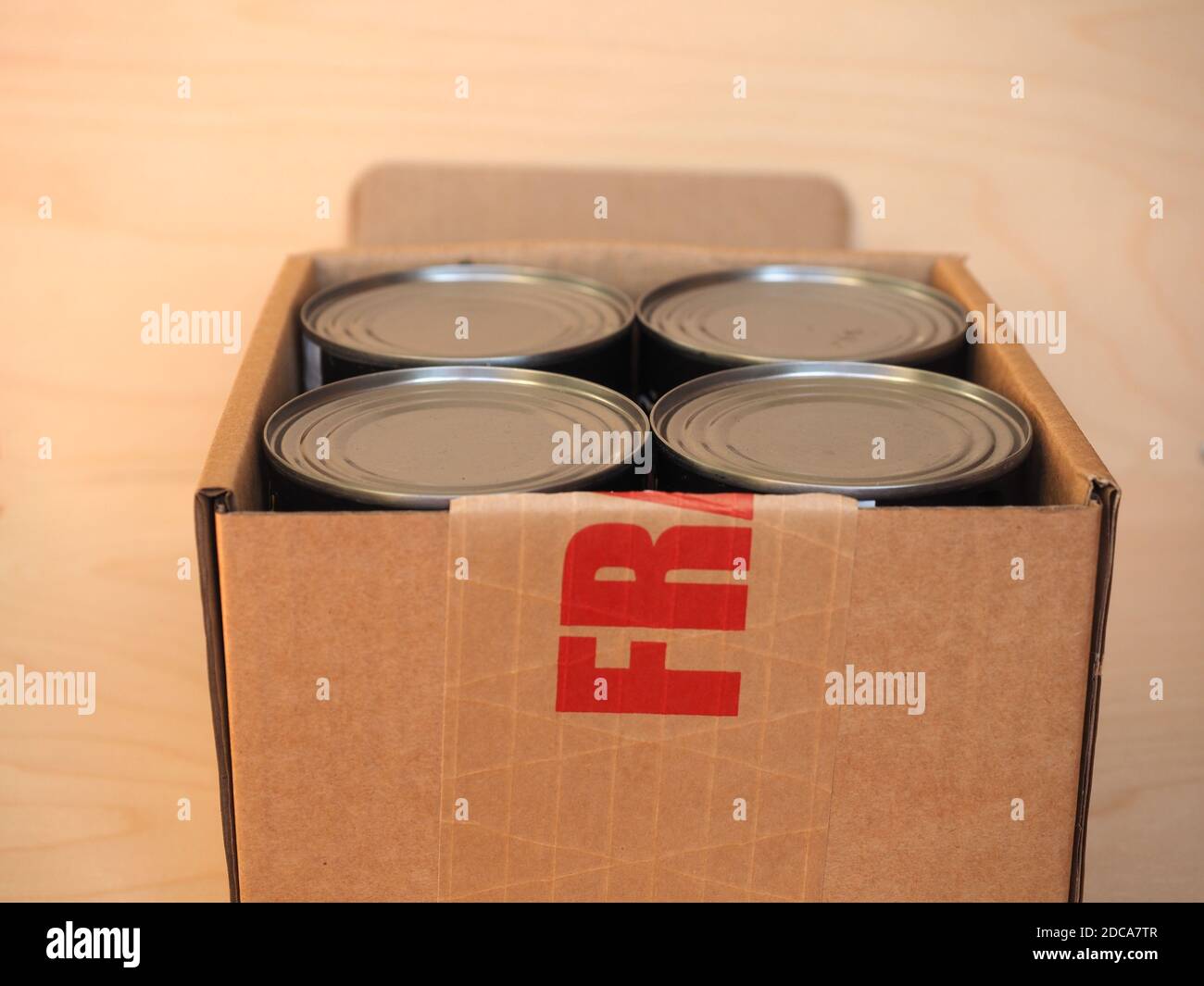 Fragile corrugated cardboard box packet parcel with tin cans Stock ...