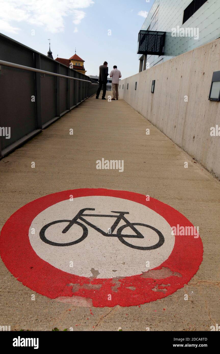 red and round no cycling traffic sign on the ground Stock Photo - Alamy