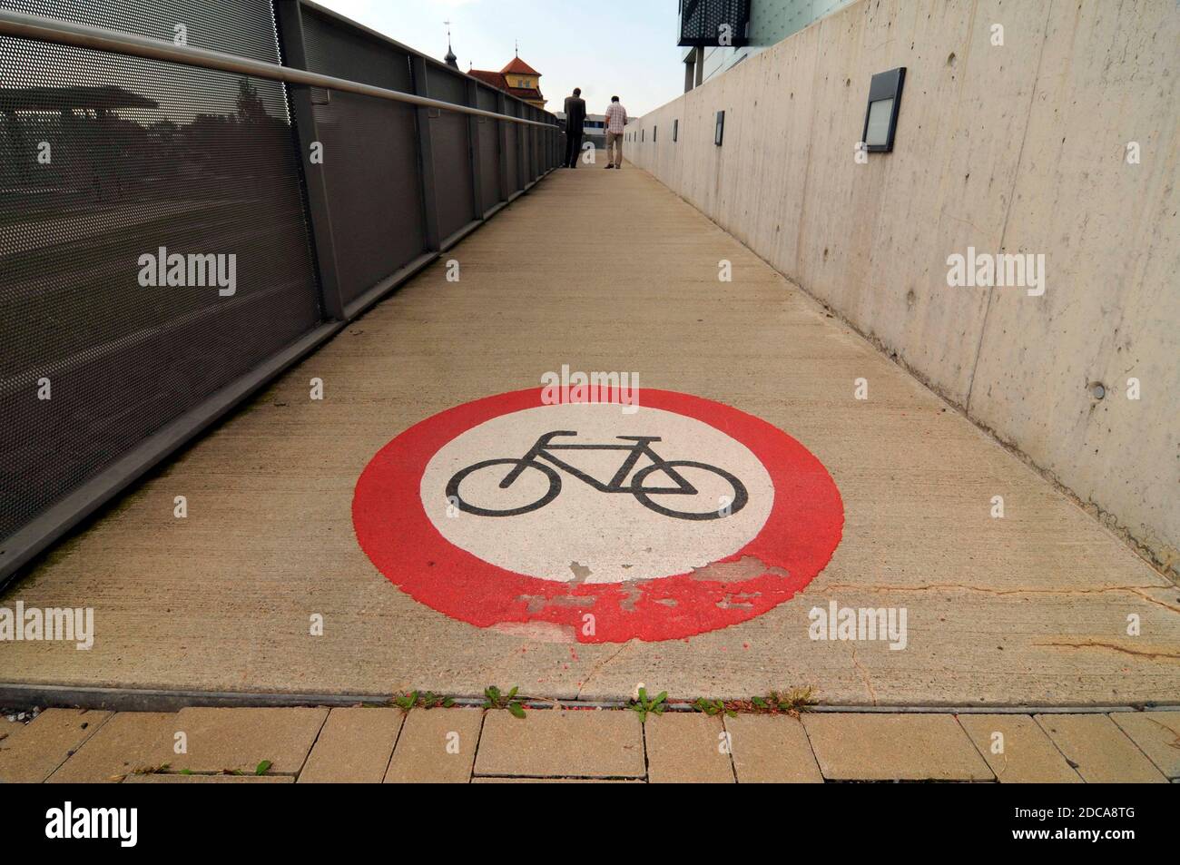 red and round no cycling traffic sign on the ground Stock Photo - Alamy