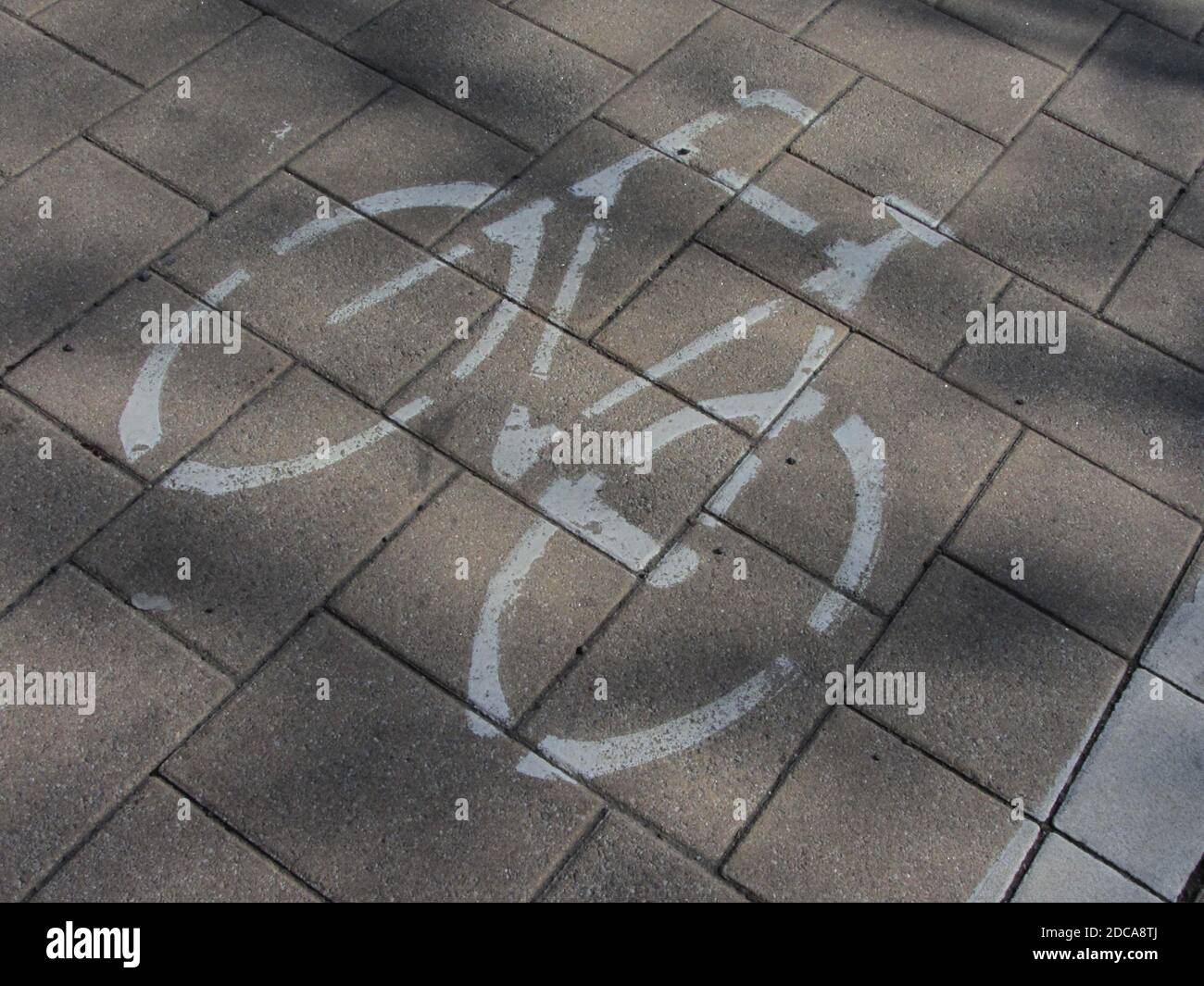 bicycle path marking on the street wtih pictogram of a bike Stock Photo ...
