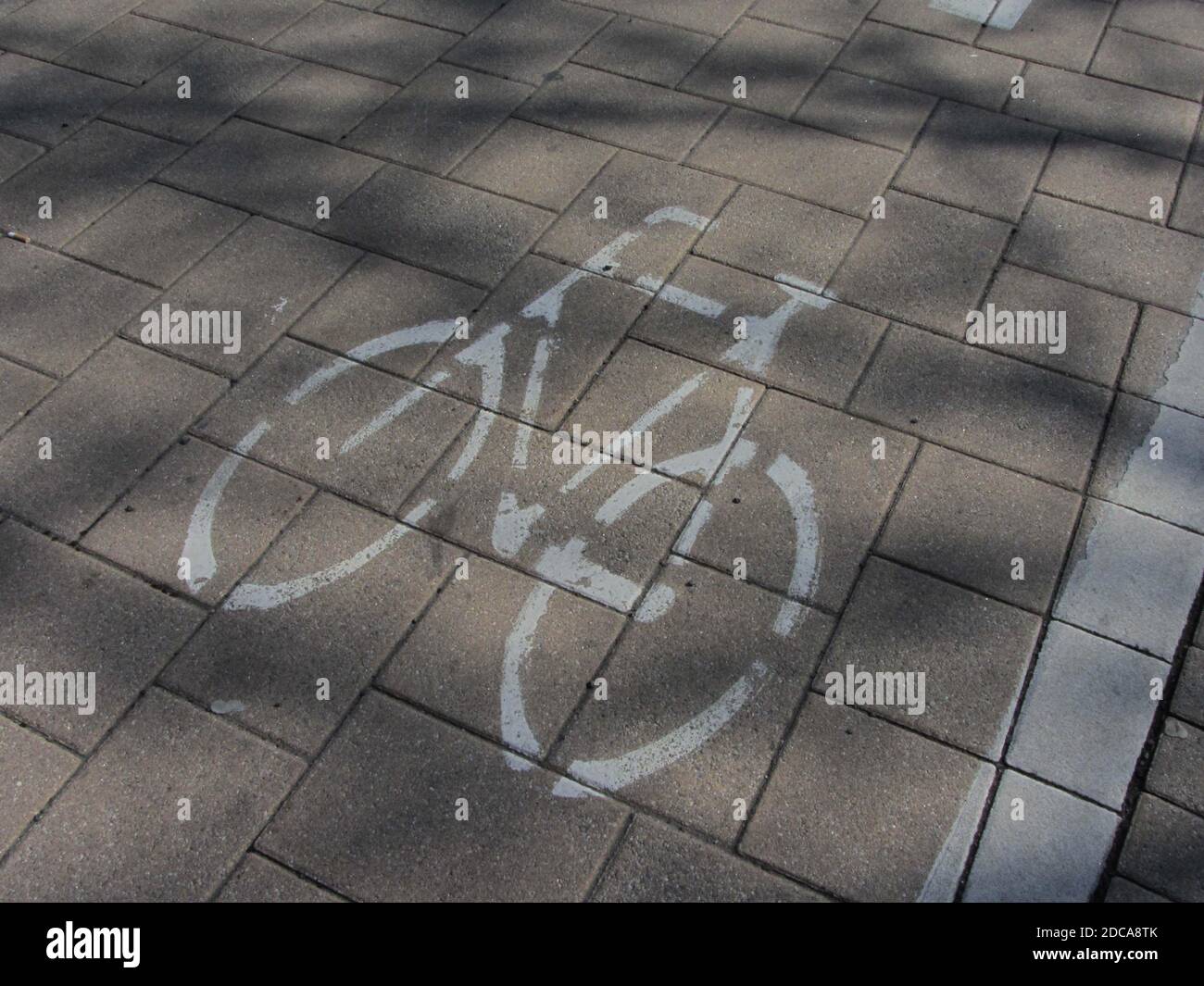 bicycle path marking on the street wtih pictogram of a bike Stock Photo ...